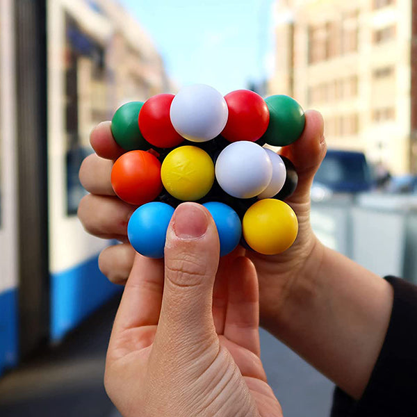 Molecube Puzzle – Present Indicative